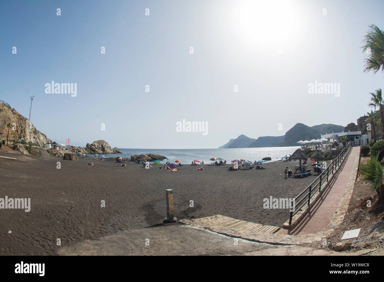 Black sand beach at Portman in Murcia, Spain Stock Photo - Alamy
