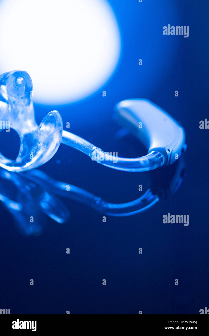Modern digital hearing aid for deafness and deaf people Stock Photo - Alamy