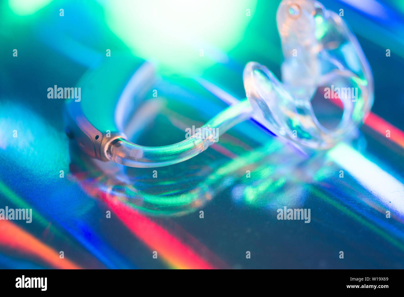 Modern digital hearing aid for deafness and deaf people Stock Photo - Alamy