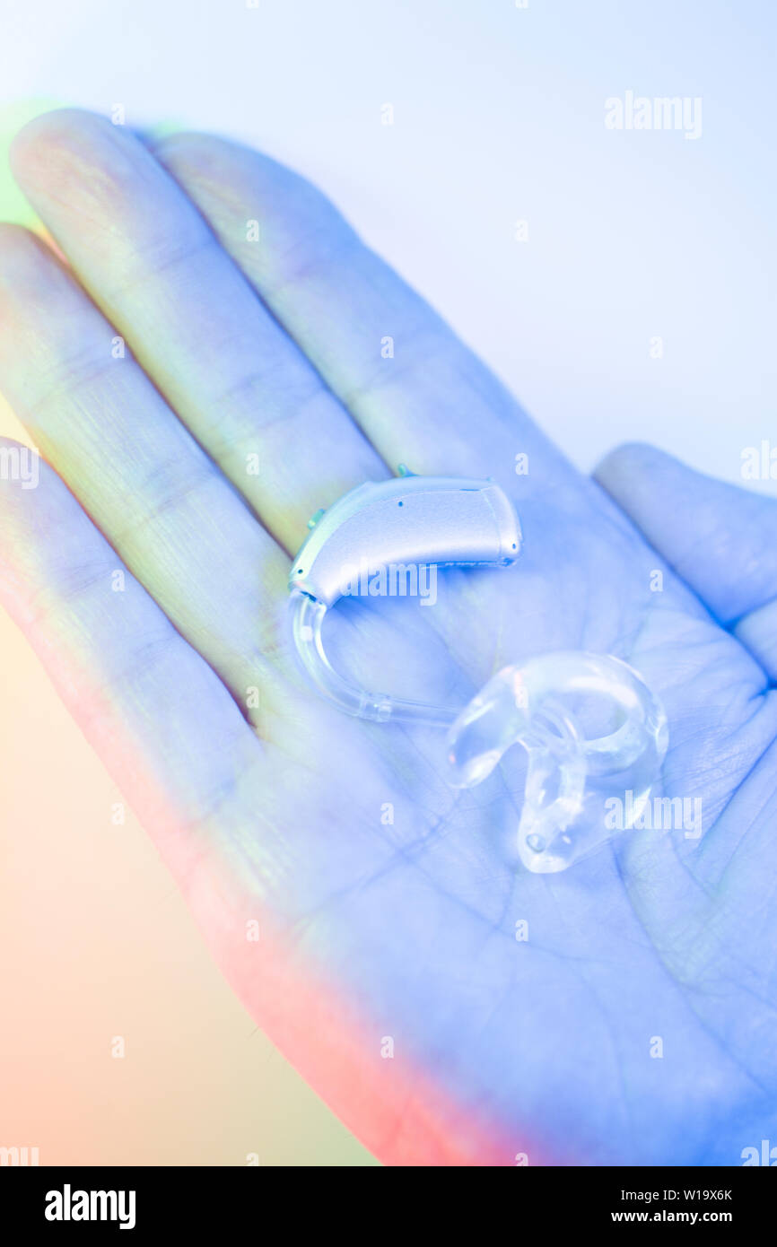 Modern digital hearing aid for deafness and deaf people Stock Photo - Alamy