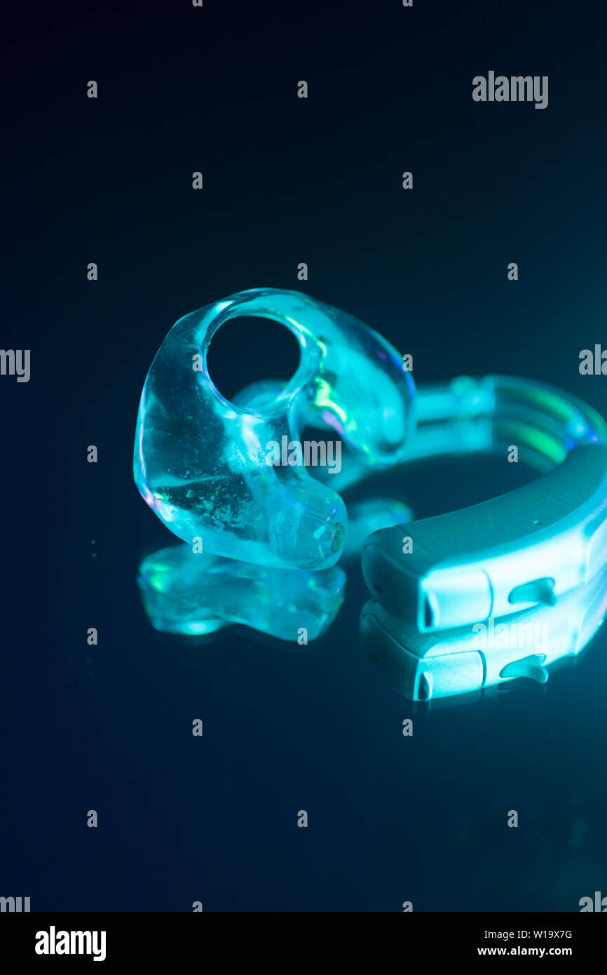 Modern digital hearing aid for deafness and deaf people Stock Photo - Alamy