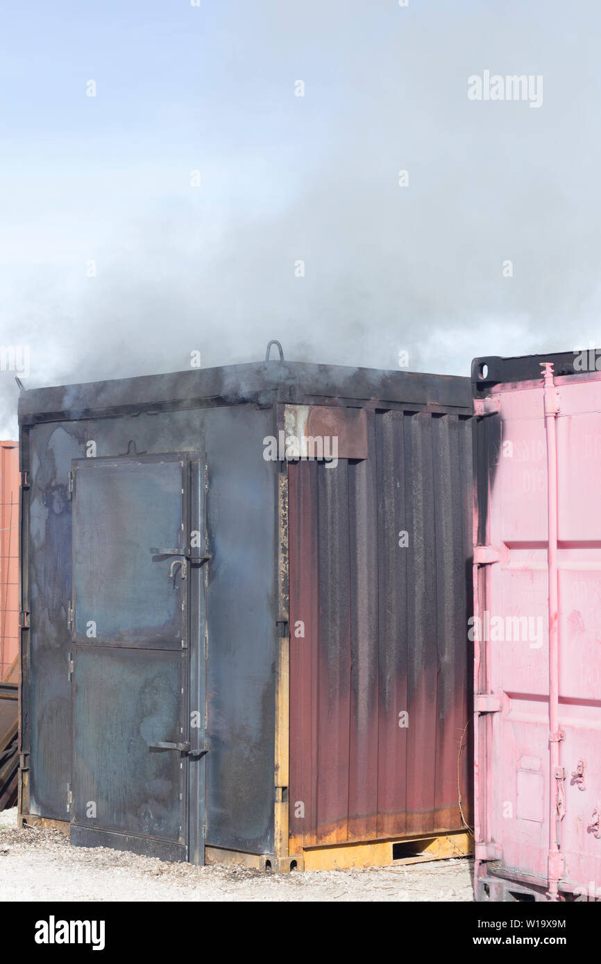 Firefighter putting out fire training station extinguisher backdraft ...