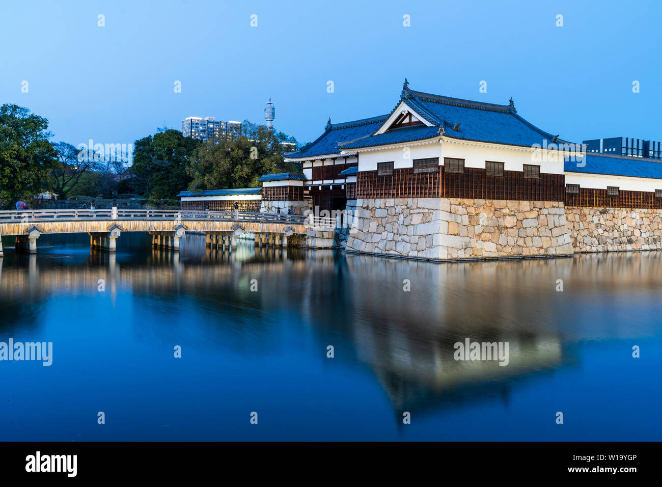 Illuminated Hiroshima Castle. The main yaguramon gate, gate with turret ...