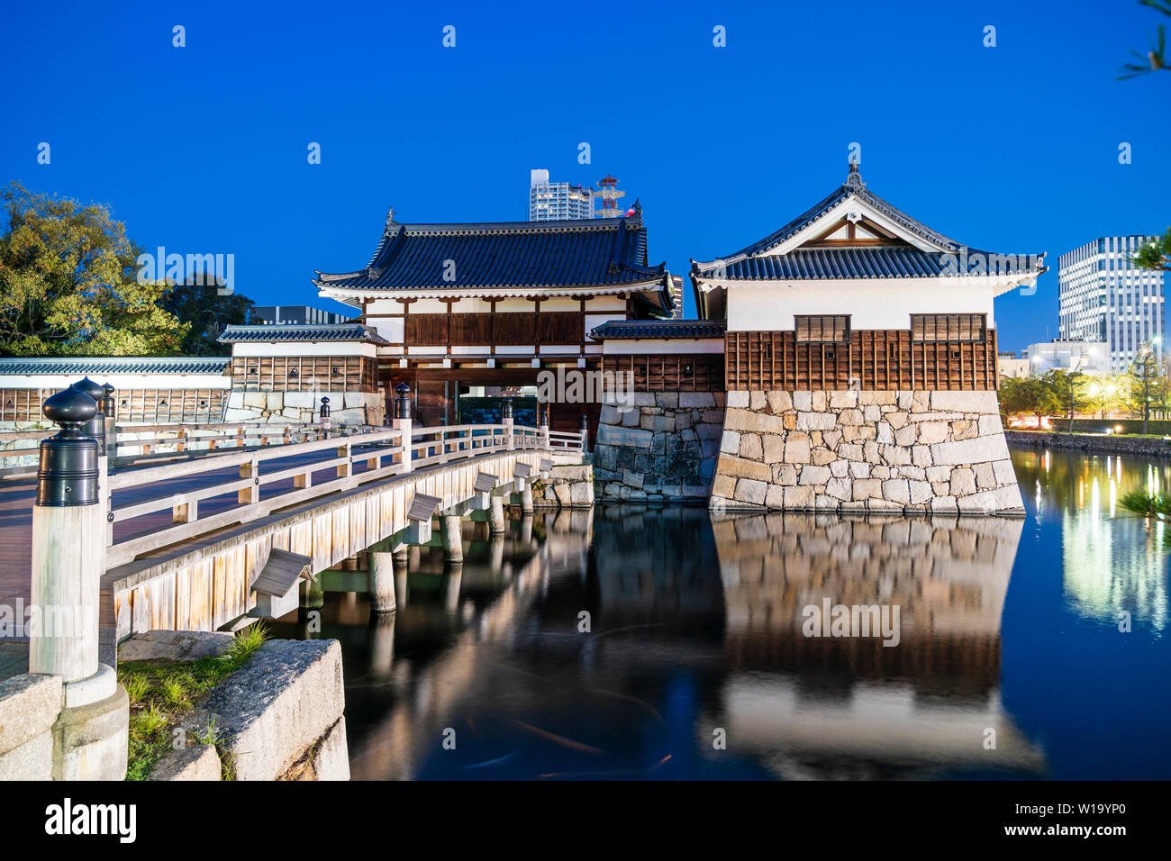 Illuminated Hiroshima Castle. The main yaguramon gate, gate with turret ...