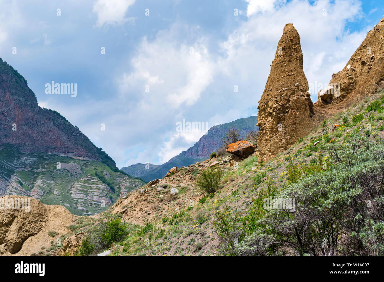 View of weathered rock after air erosion in mountains Stock Photo - Alamy