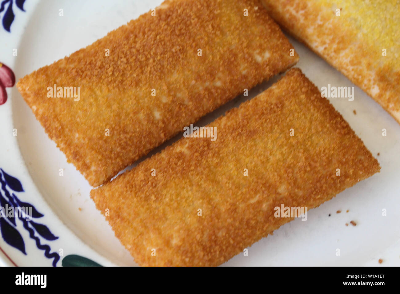 close up of kaassoufflé, a Dutch snack of melted cheese inside a thin ...