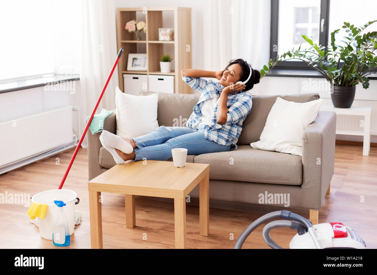 African woman cleaning house in hi-res stock photography and images - Alamy