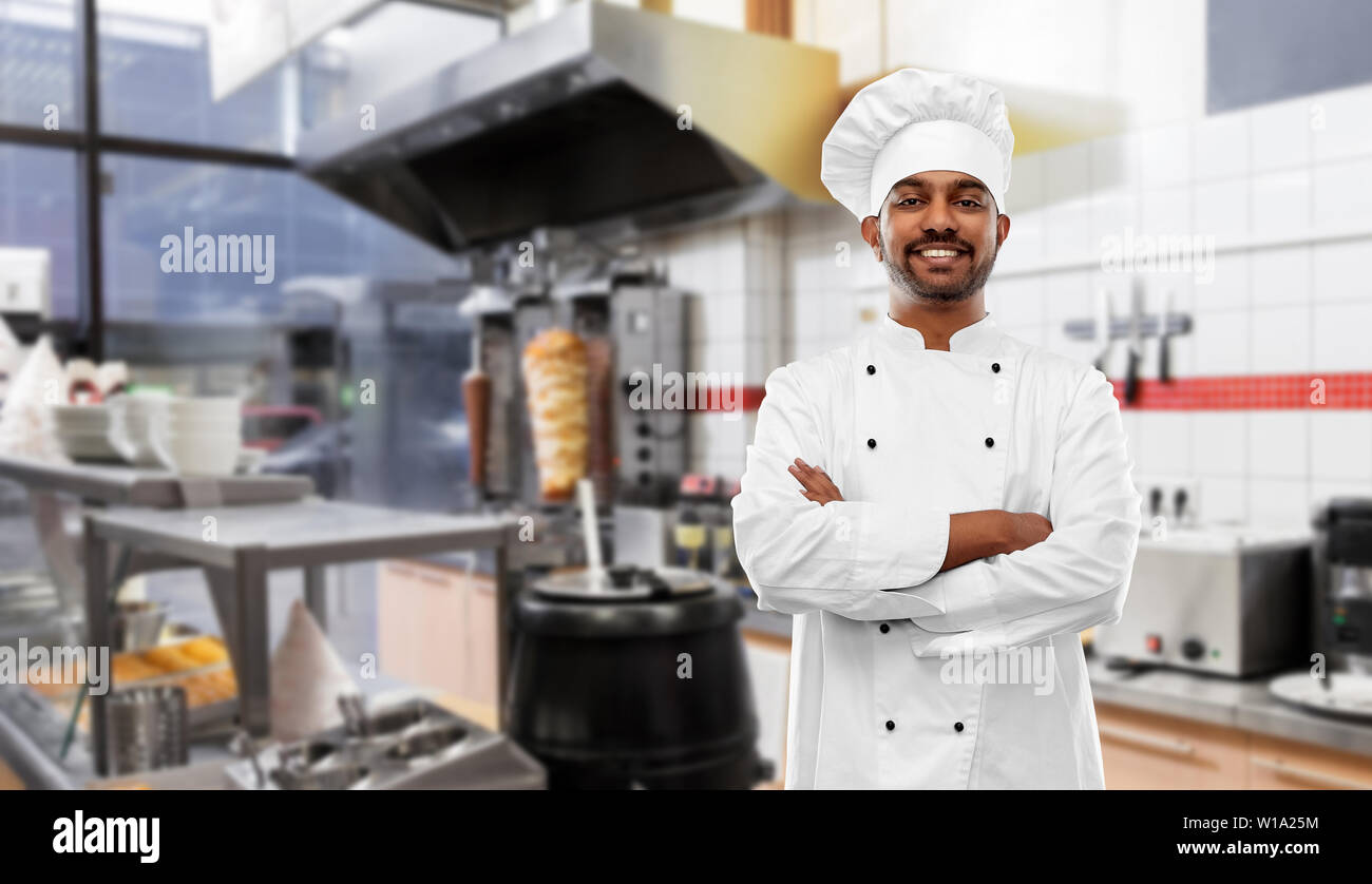 happy male indian chef in toque at kebab shop Stock Photo - Alamy