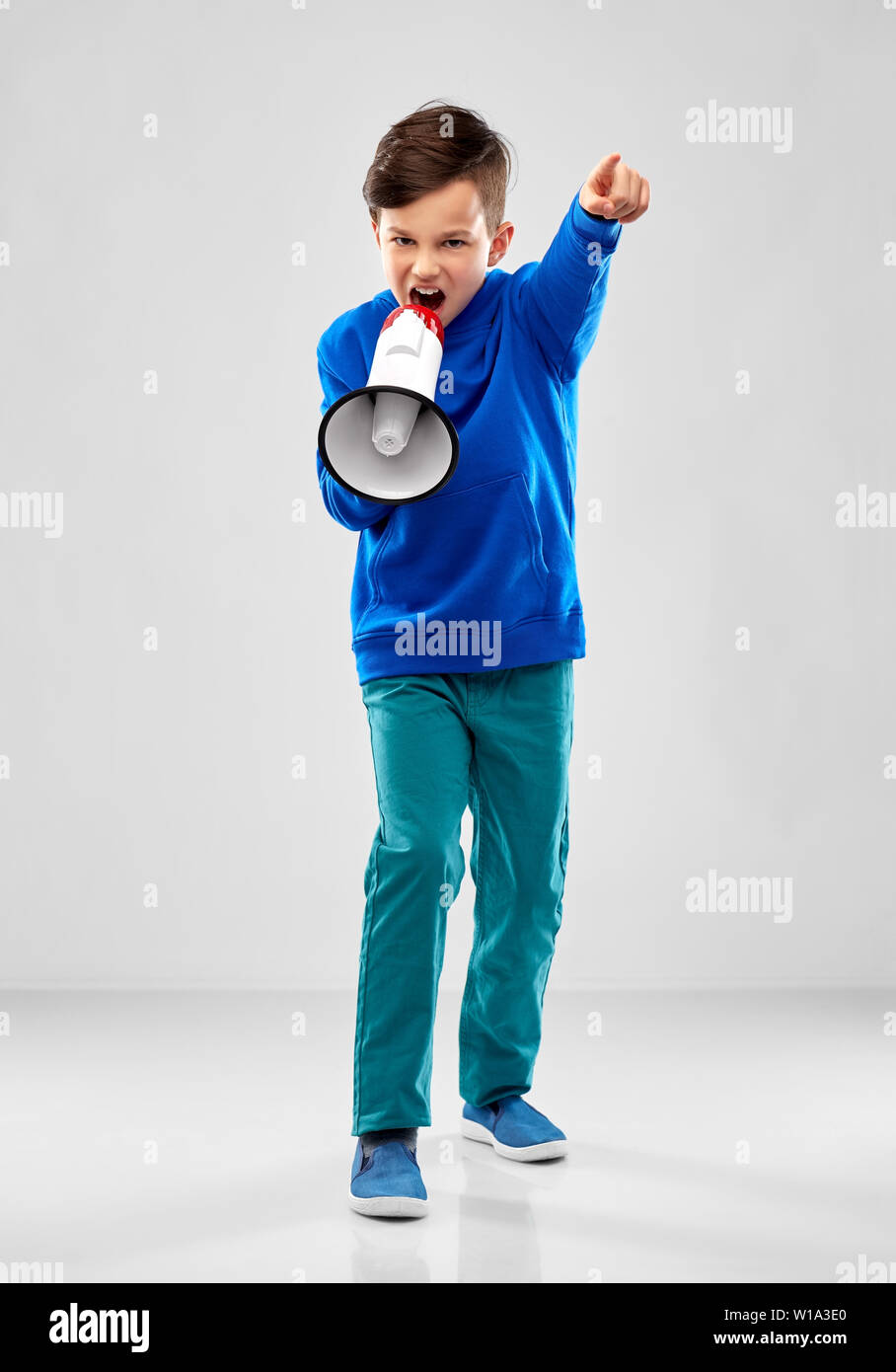 Angry boy full length hi-res stock photography and images - Alamy