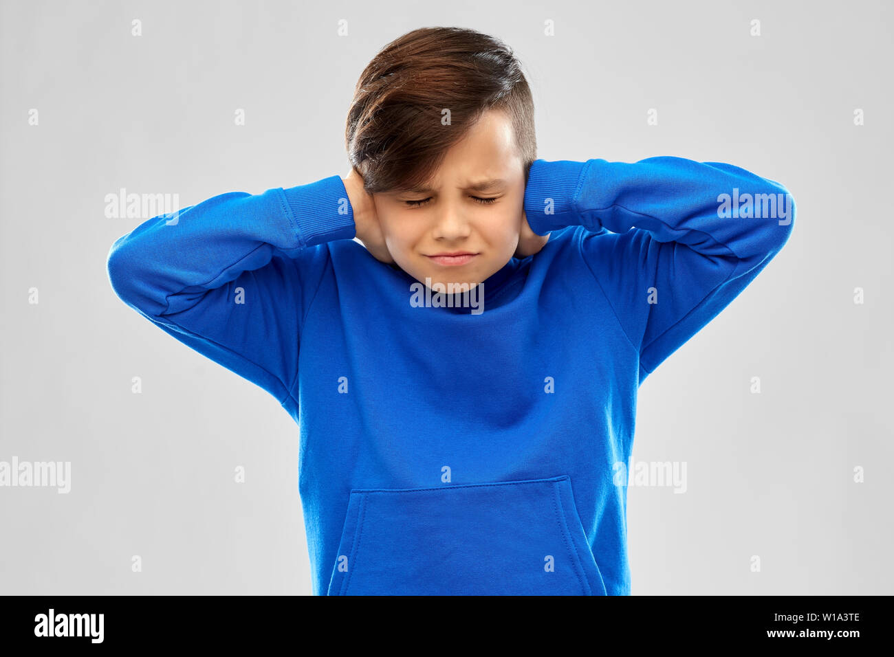 Child hand ear sad hi-res stock photography and images - Alamy