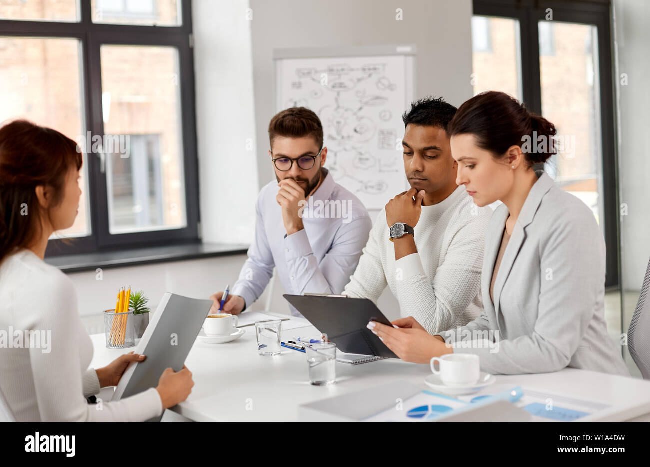 recruiters having job interview with employee Stock Photo - Alamy