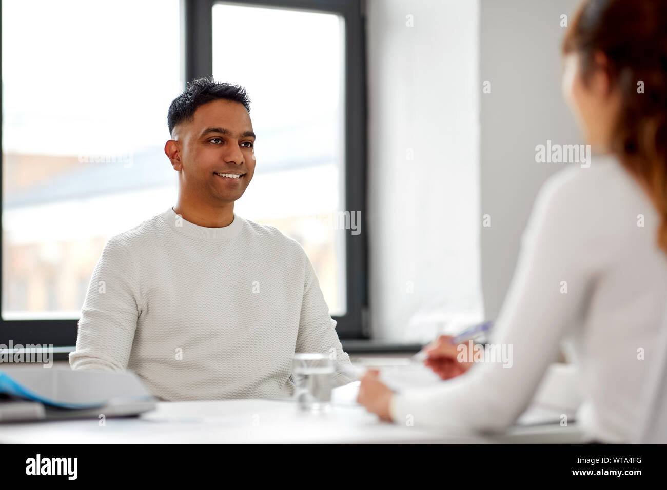employee having interview with employer at office Stock Photo - Alamy