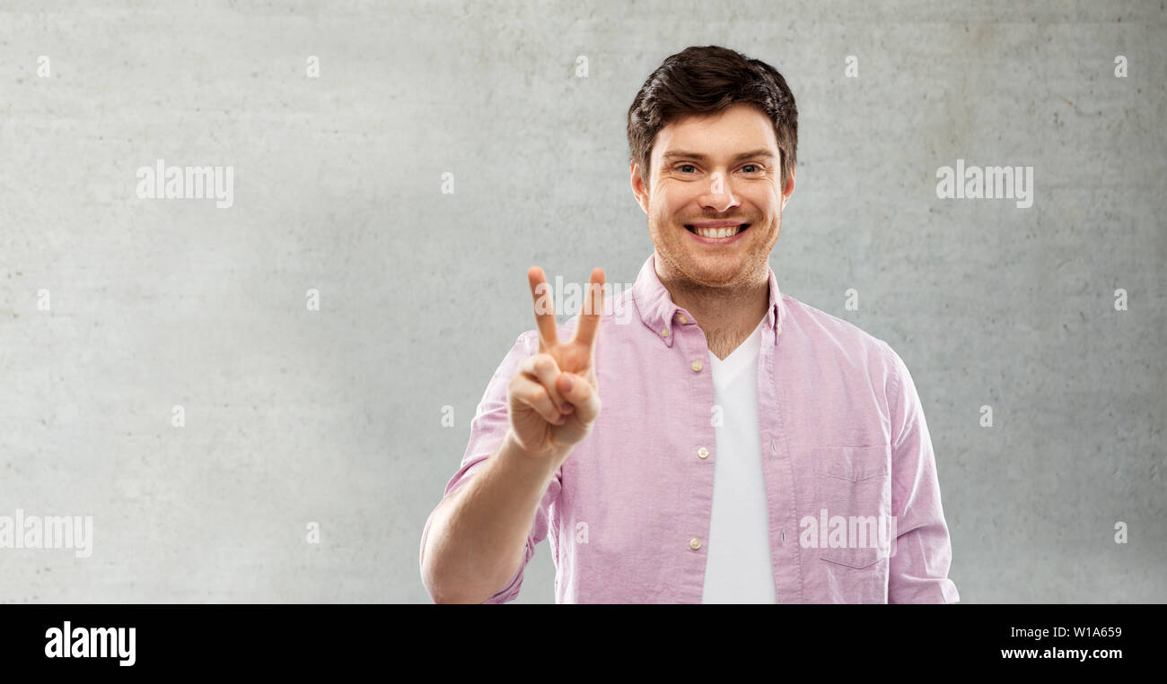 Peace sign hand showing two hi-res stock photography and images - Alamy