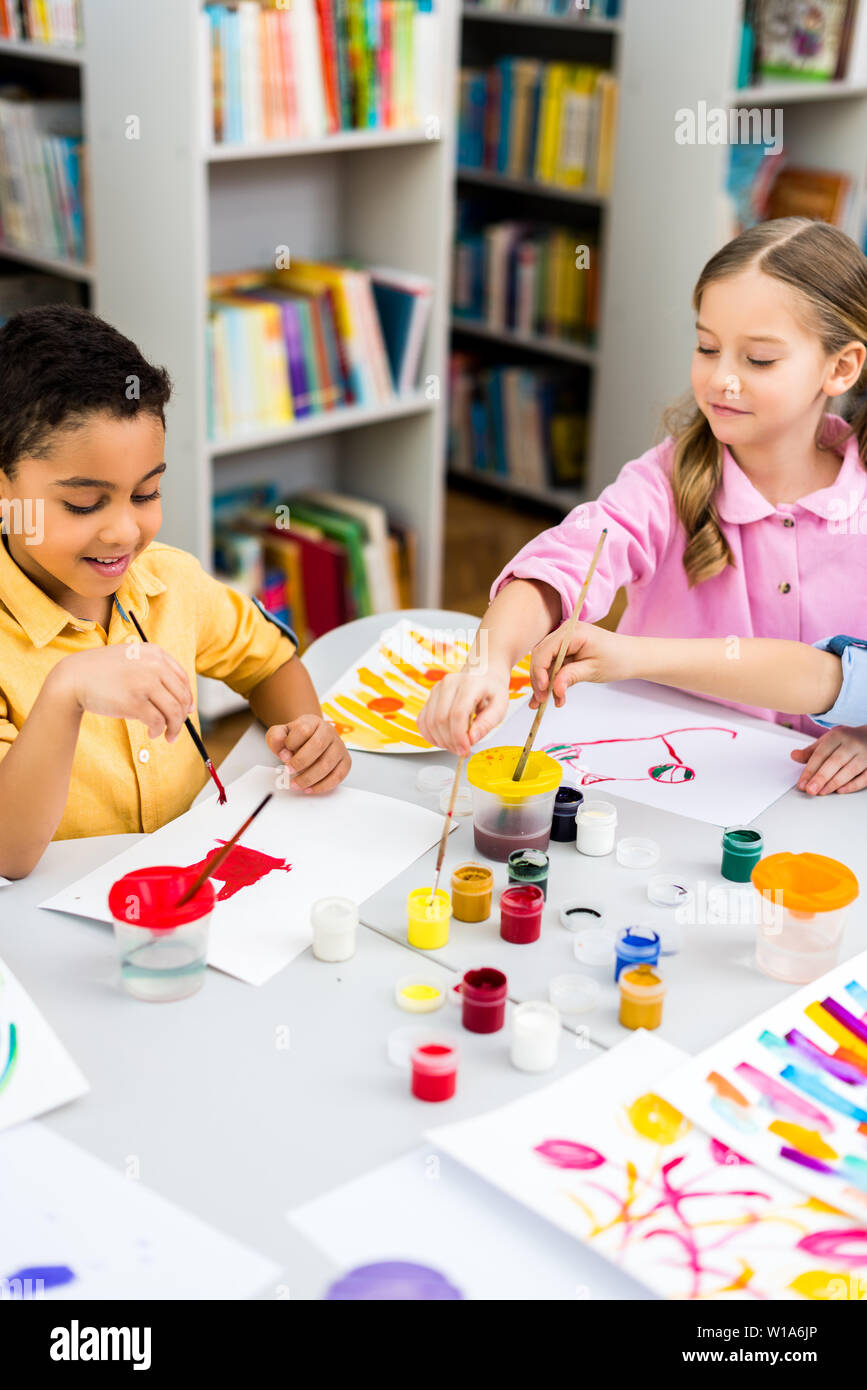 Multicultural kids painting hi-res stock photography and images - Alamy
