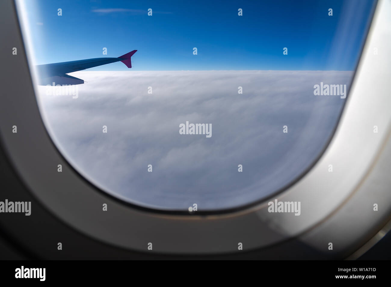 The window of the airplane. A view of porthole window on board an ...