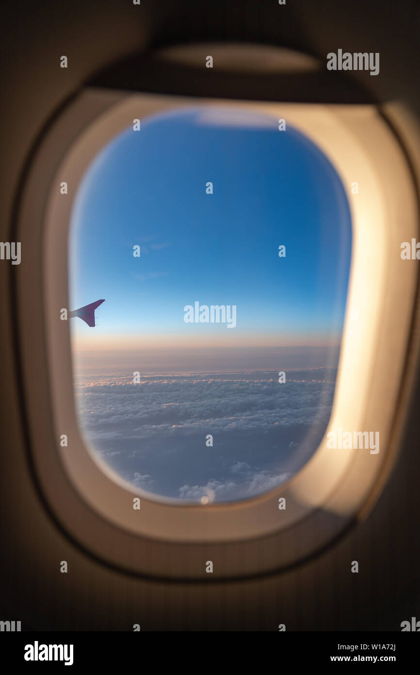 The window of the airplane. A view of porthole window on board an ...
