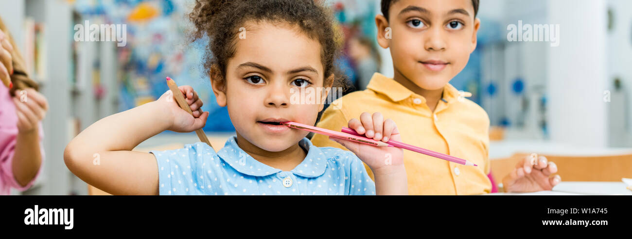 Biting pencil hi-res stock photography and images - Alamy