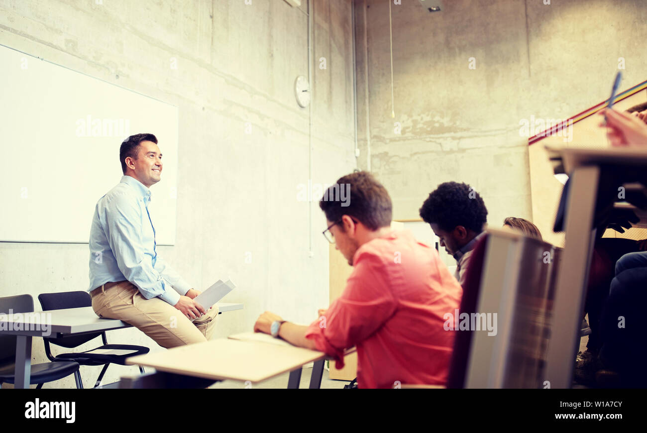 group of students and teacher at lecture Stock Photo - Alamy