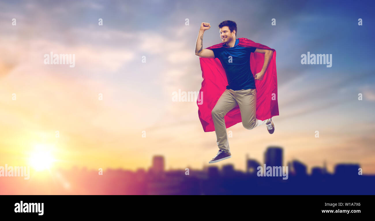 Man flying over city hi-res stock photography and images - Alamy