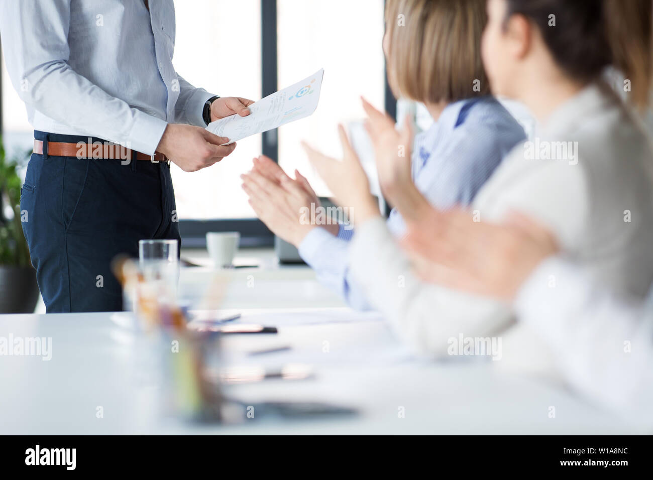 business team at office meeting or presentation Stock Photo - Alamy