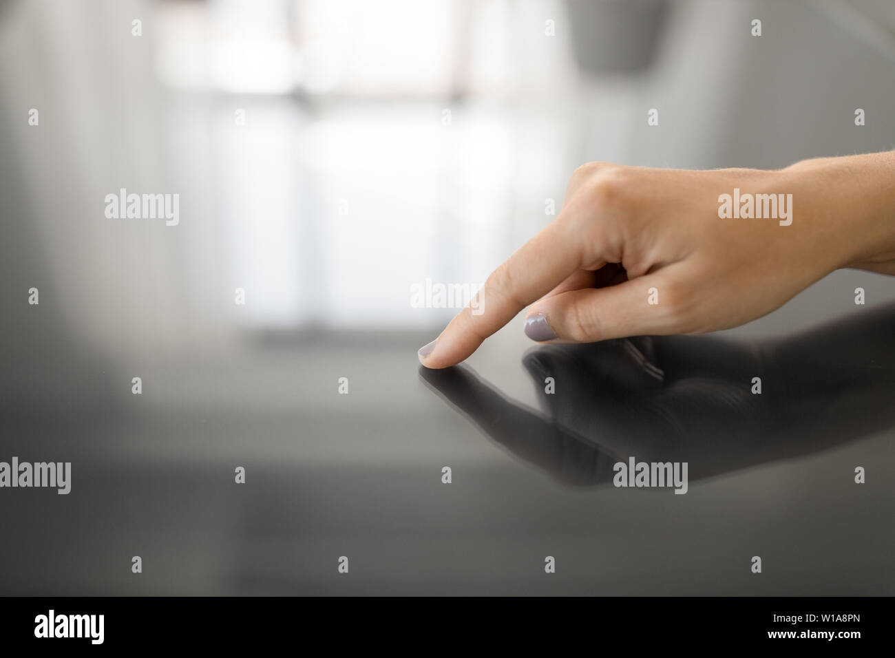 hand using black interactive panel Stock Photo - Alamy