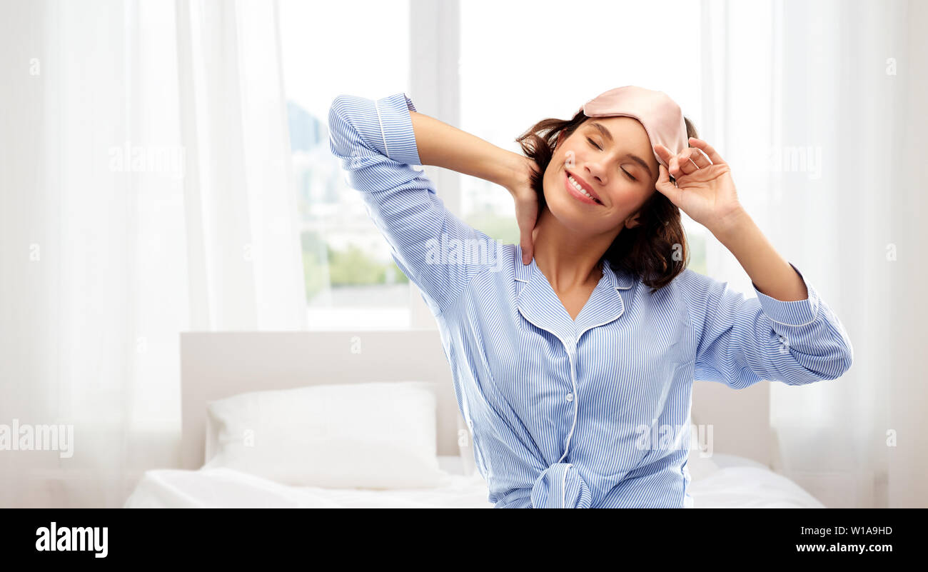 Woman sleeping bed happy eye mask hi-res stock photography and images ...
