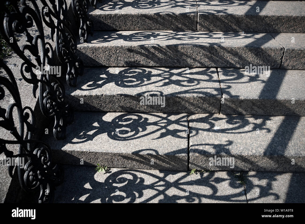 Steps and abstract shadow of decorative fence Stock Photo - Alamy