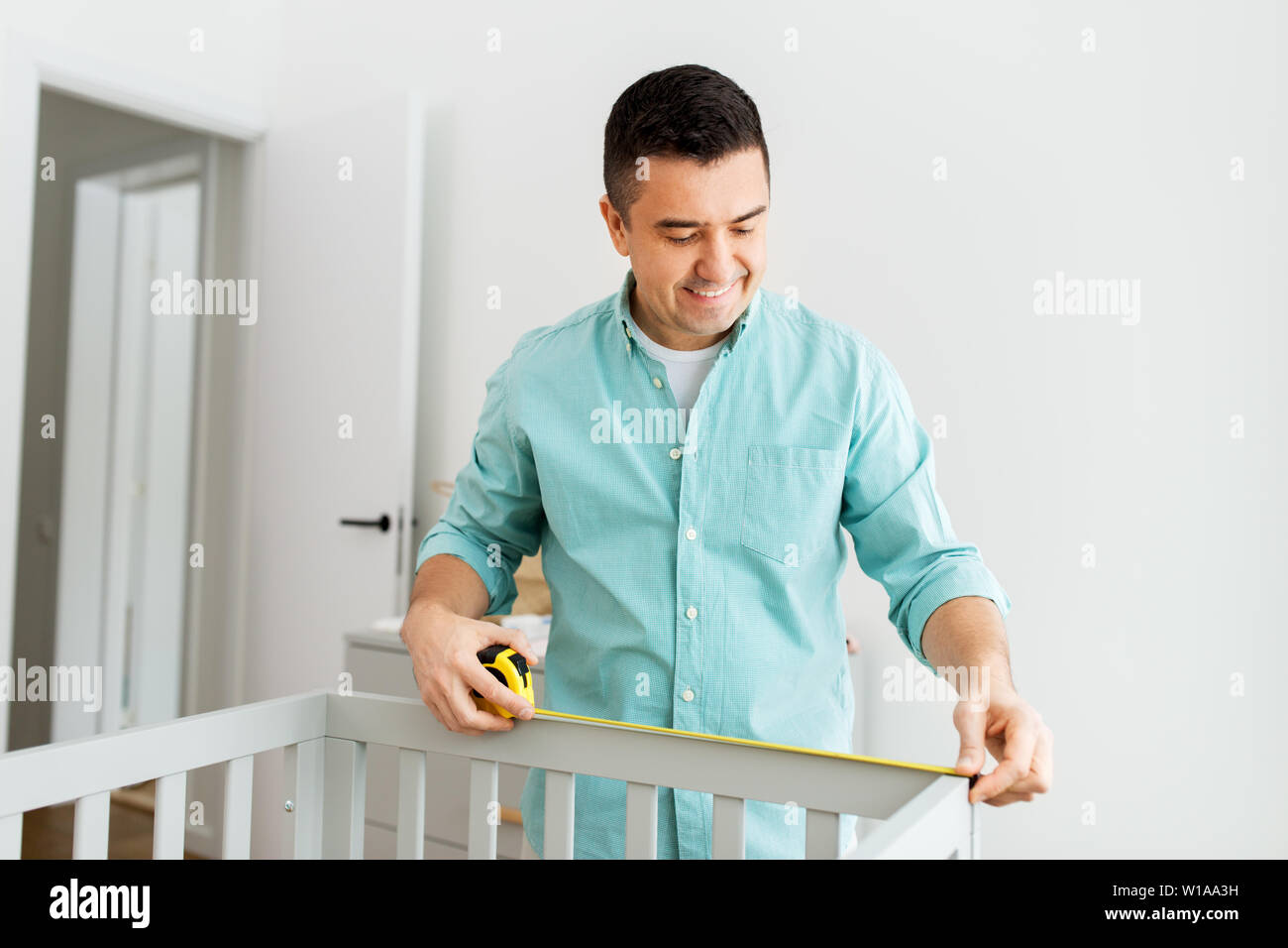Children measuring with ruler hi-res stock photography and images - Alamy