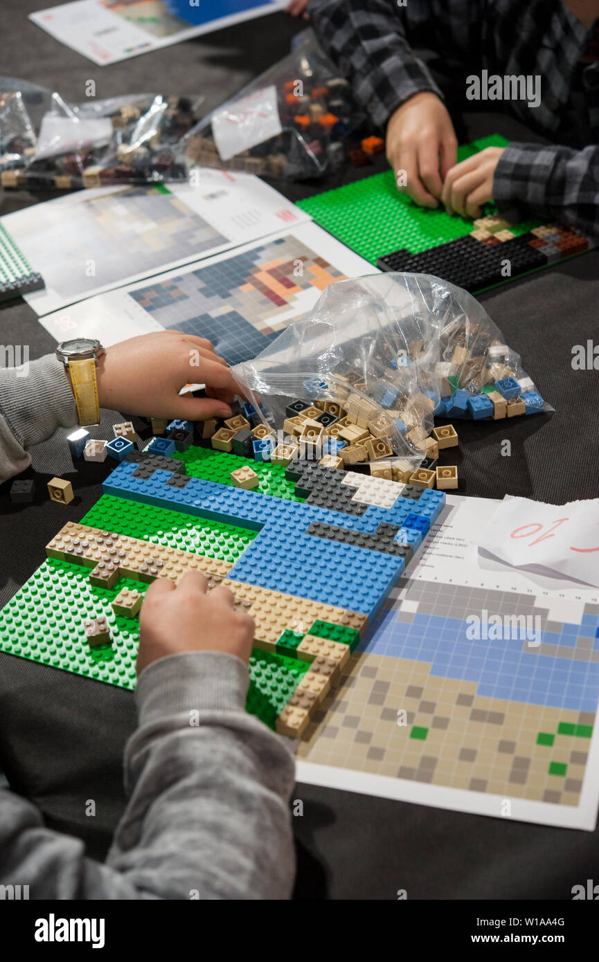 Children build a Lego bricks mosaic during a public competition Stock ...