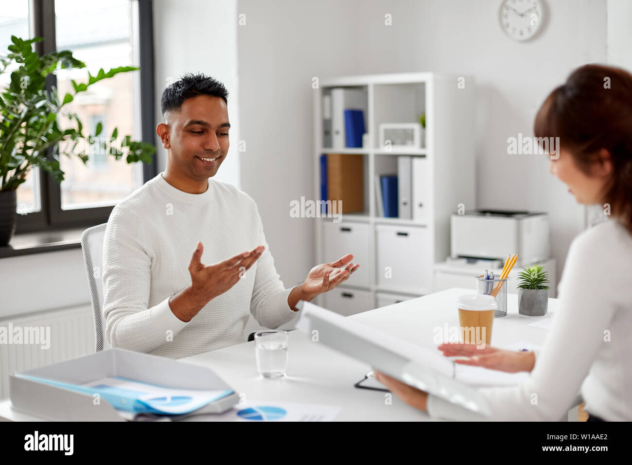 employee having interview with employer at office Stock Photo - Alamy