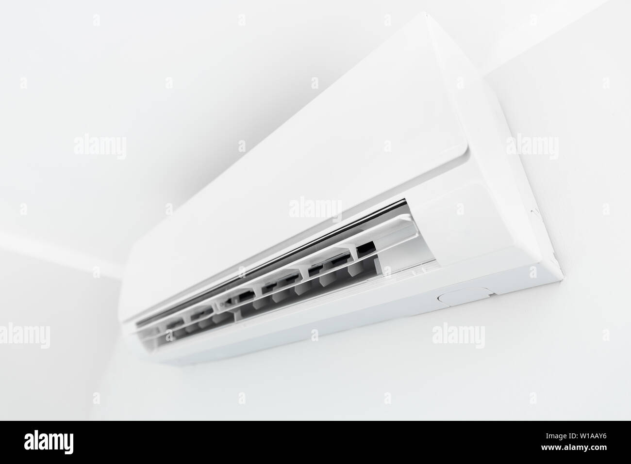 Air conditioner system on white wall room. Air conditioning Stock Photo ...