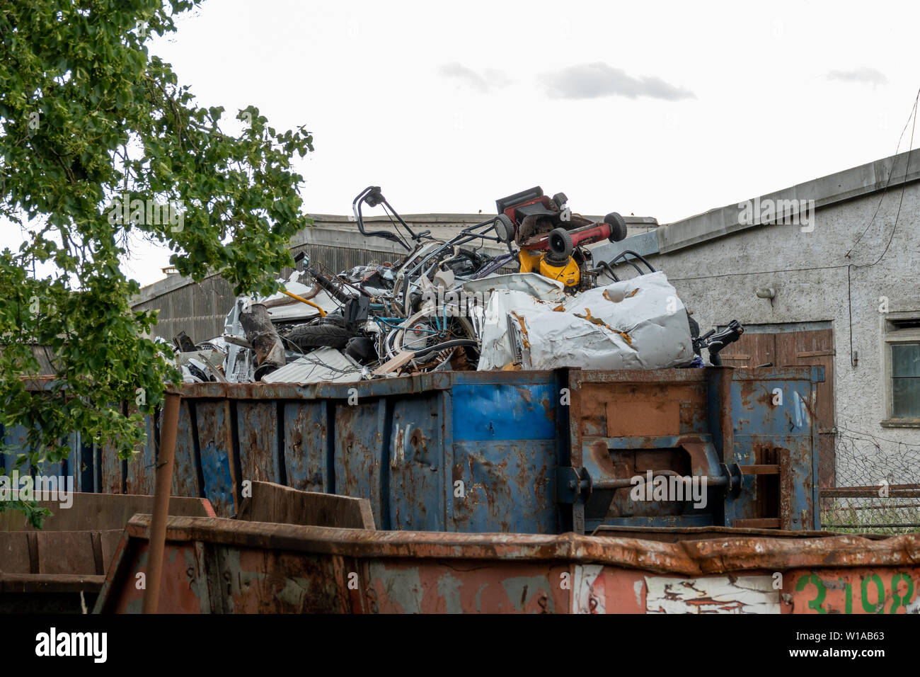 Metal scrap is located in large containers Stock Photo - Alamy