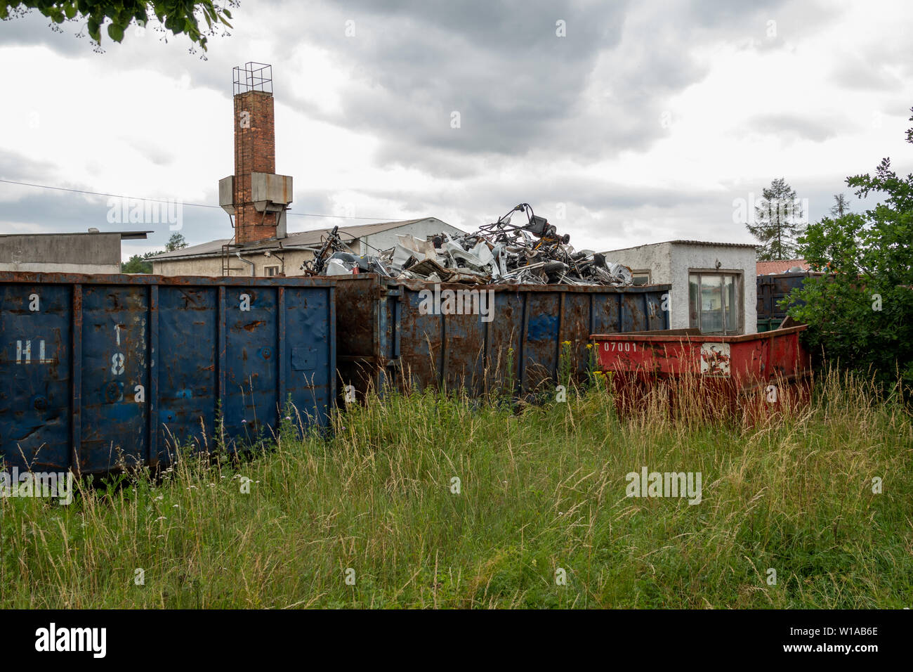 Metal scrap is located in large containers Stock Photo - Alamy