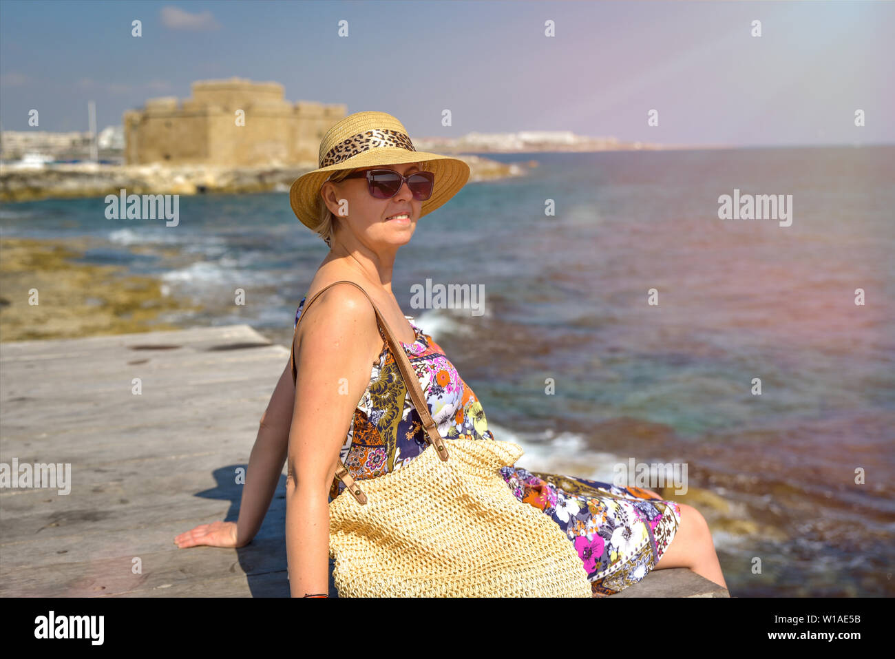 Mature Woman Sitting On Pier High Resolution Stock Photography and ...
