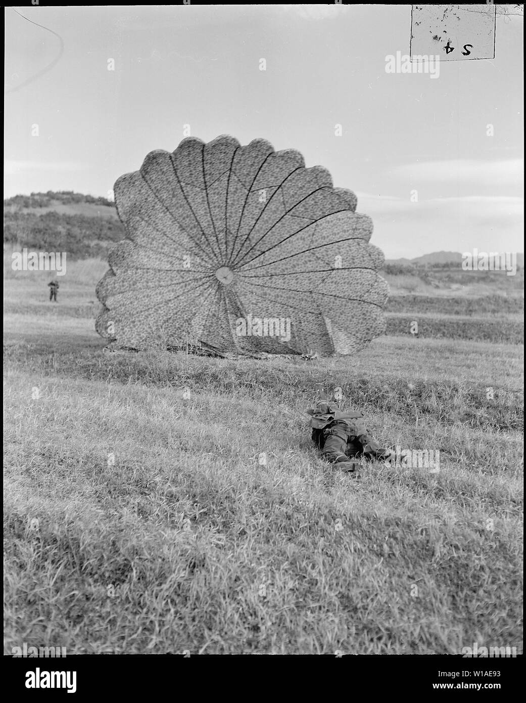 A Republic of Korea paratrooper deflates his parachute following a ...