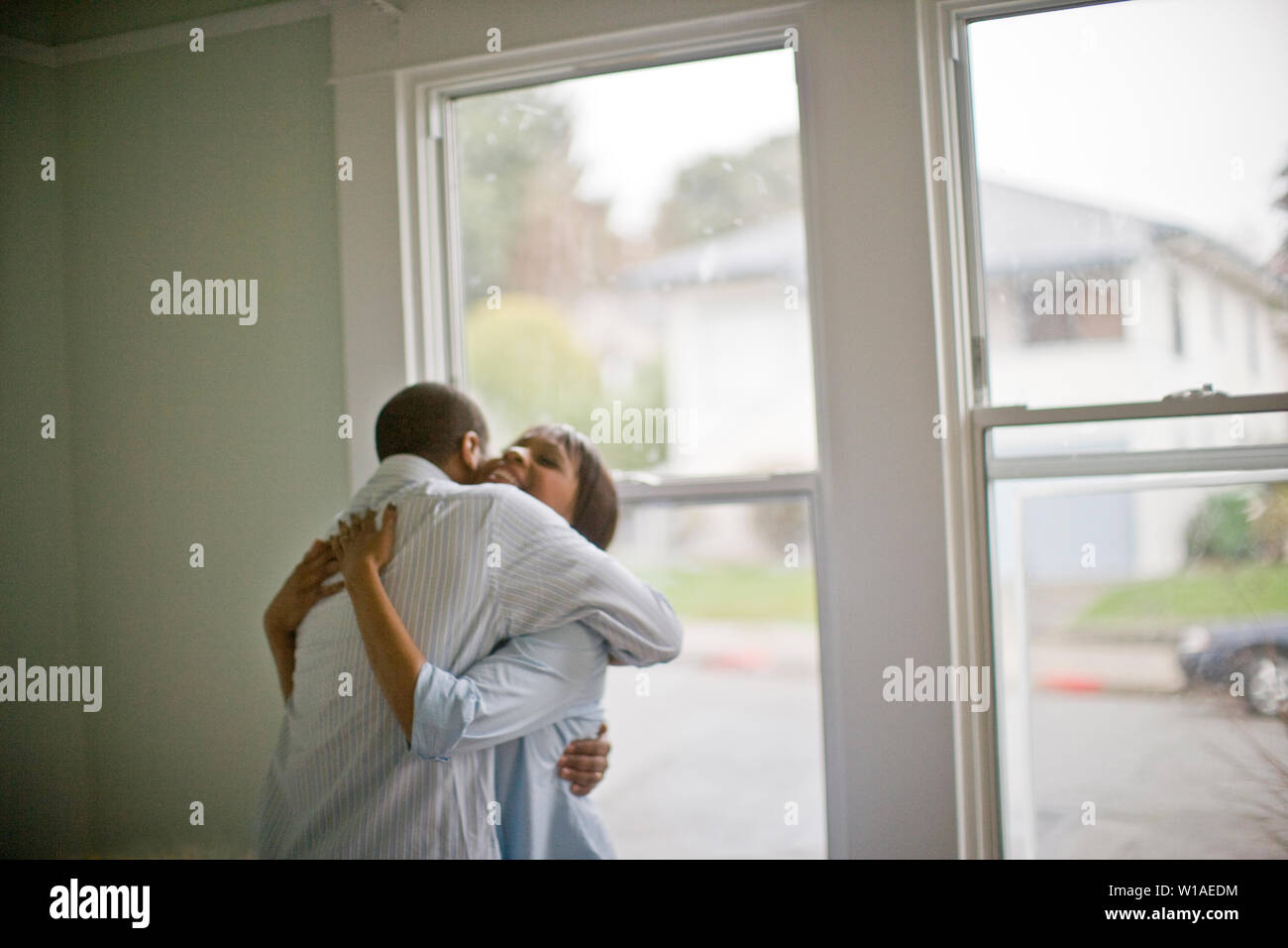 Couple hugging each other Stock Photo - Alamy