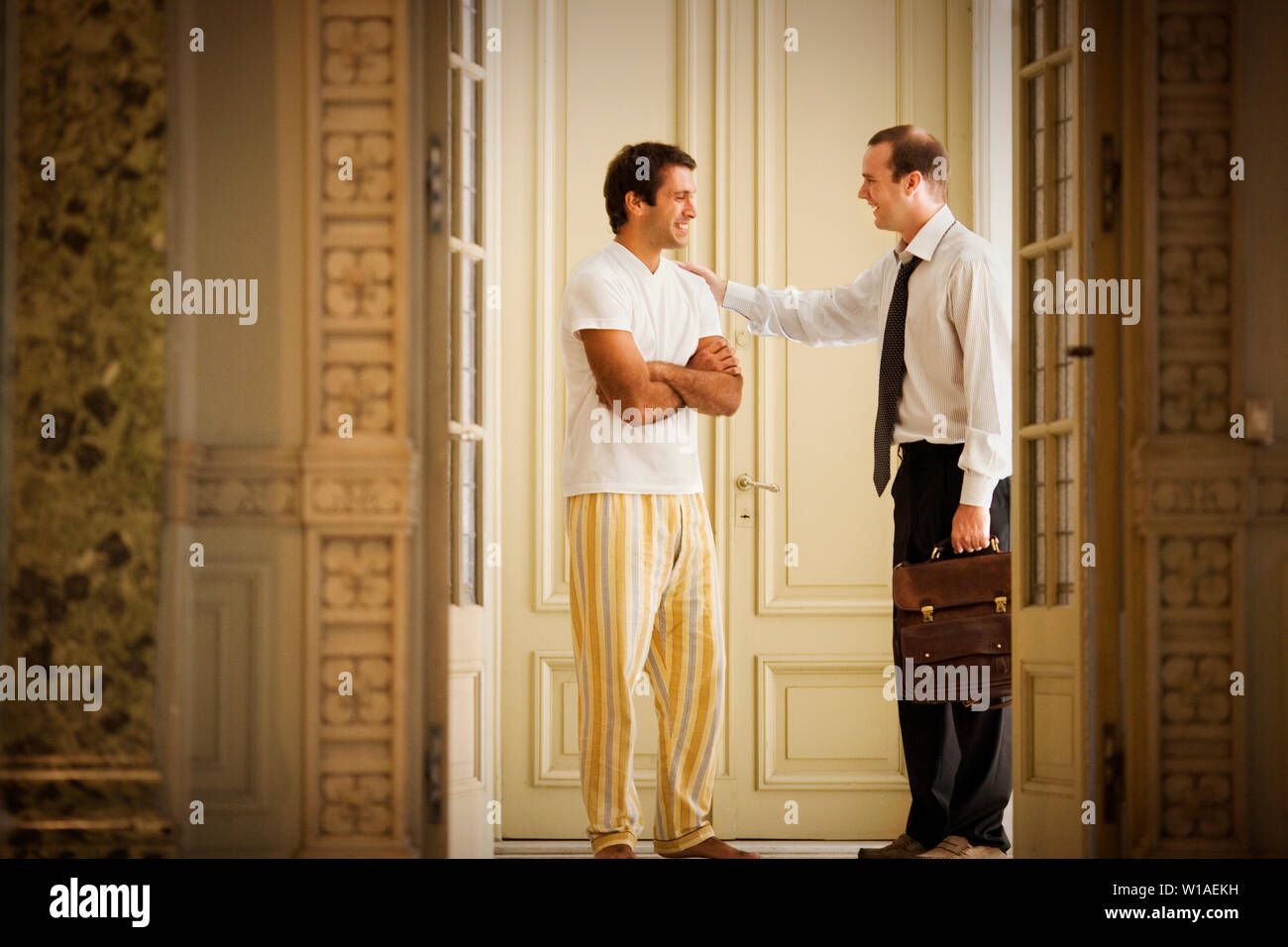 View of two men in a conversation Stock Photo - Alamy