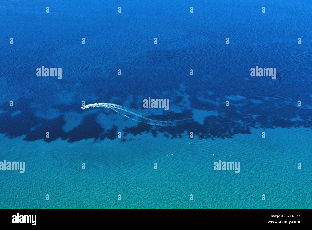 Aerial view of speed boat in motion. Water transportation and summer ...