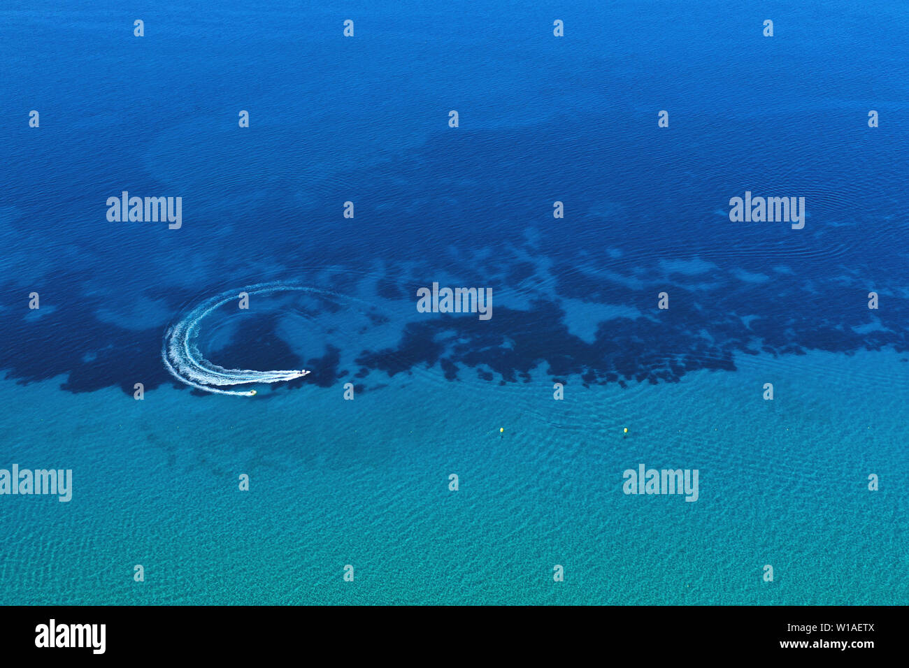 Aerial view of speed boat in motion. Water transportation and summer ...