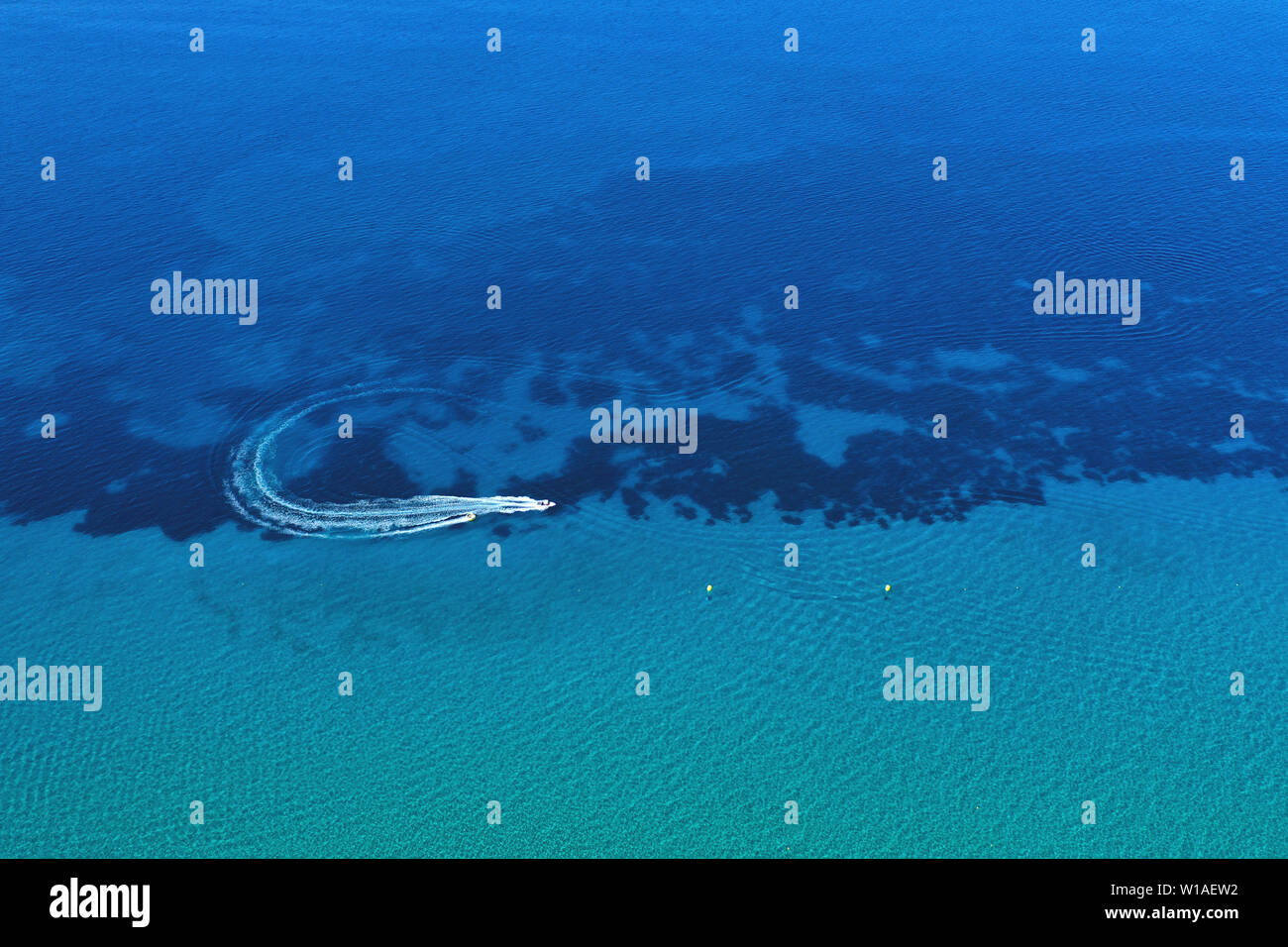 Aerial view of speed boat in motion. Water transportation and summer ...