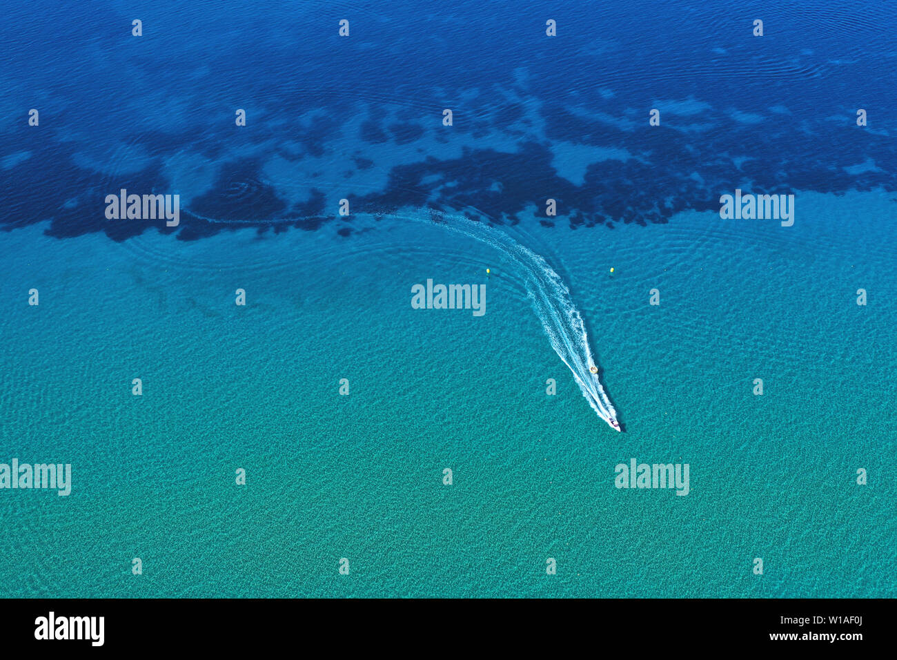Aerial view of speed boat in motion. Water transportation and summer ...