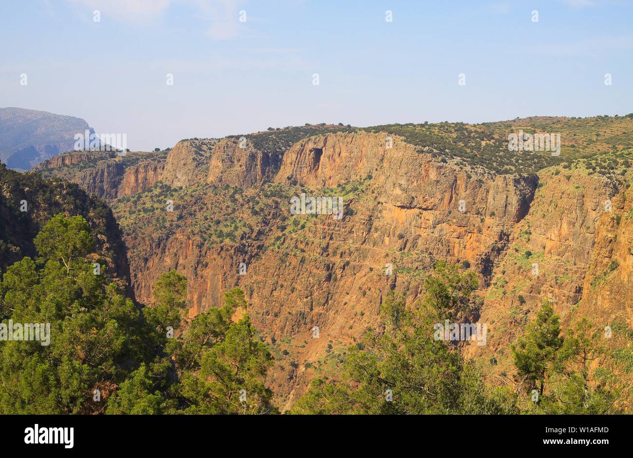 View on steep red cliff of Ourika valley - Morocco Stock Photo - Alamy