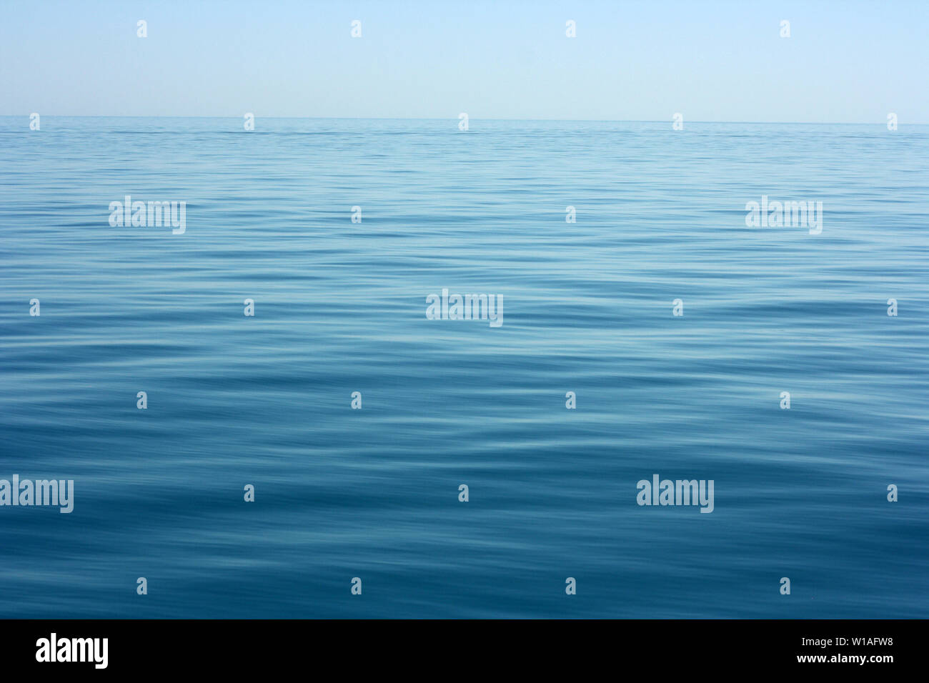 Abstract blue calm sea or ocean water surface background Stock Photo ...