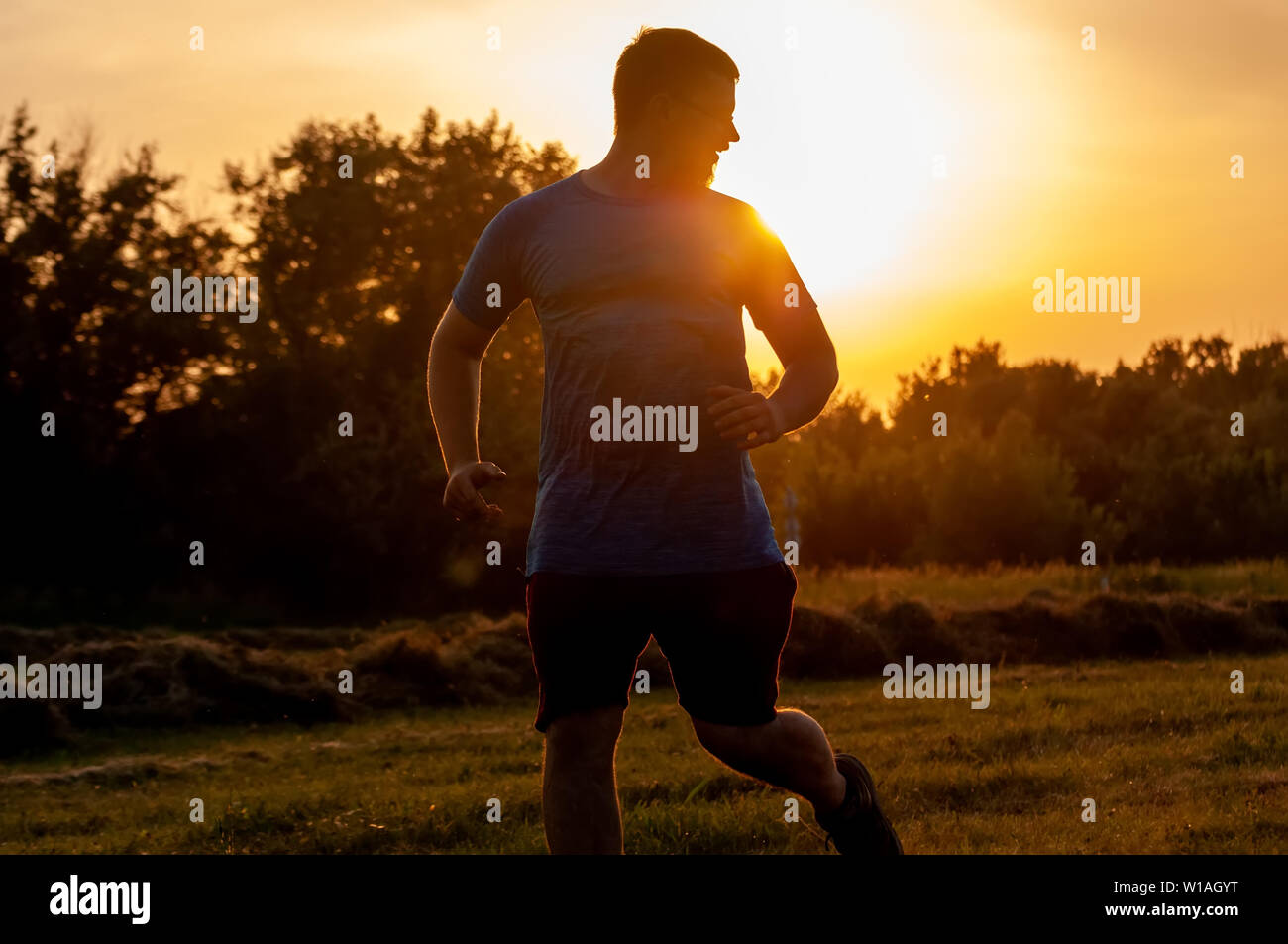Handsome man running hi-res stock photography and images - Alamy
