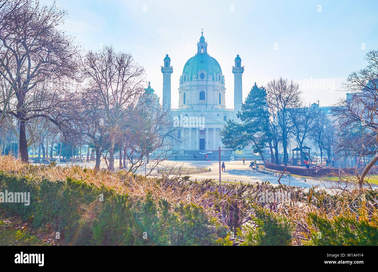 The morning walk along small cozy Resselpark in central Vienna with ...