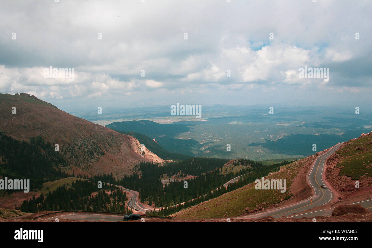 Mountain winding road an summer or spring day Stock Photo - Alamy