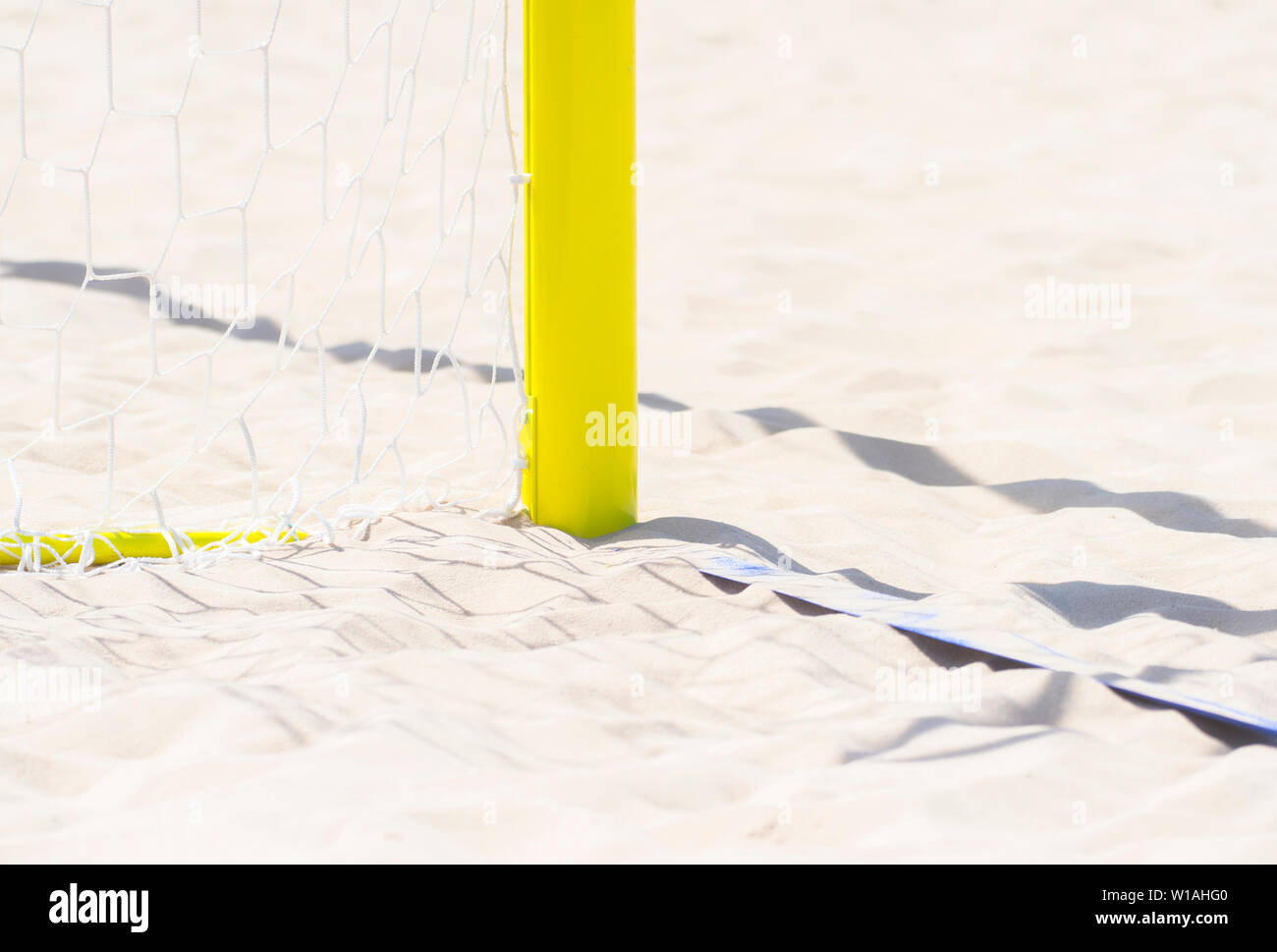 football summer sport. closeup goal net on a sandy beach outdoor Stock ...