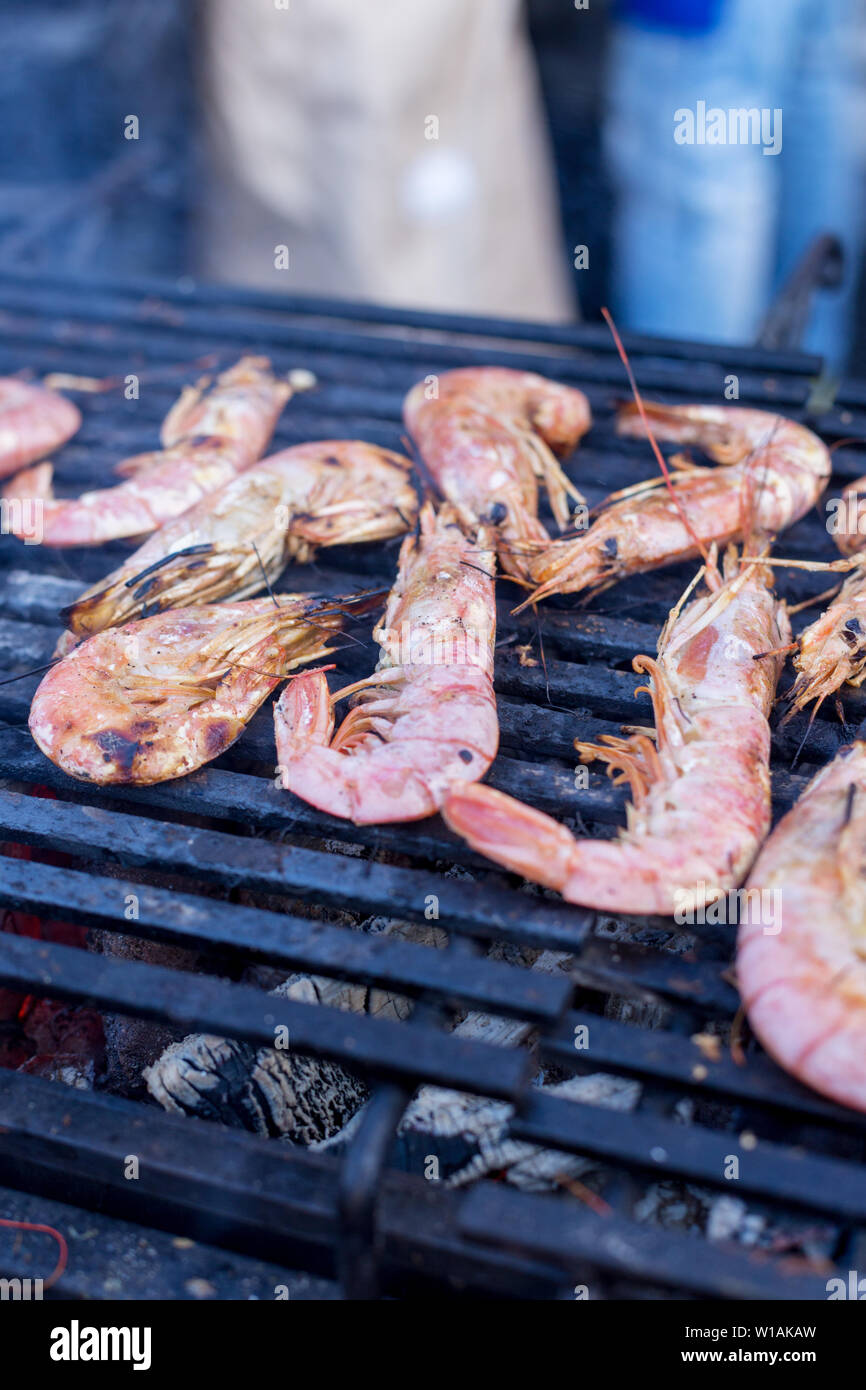 Kings shrimps on open grill with smoke. Concept of street food Stock ...