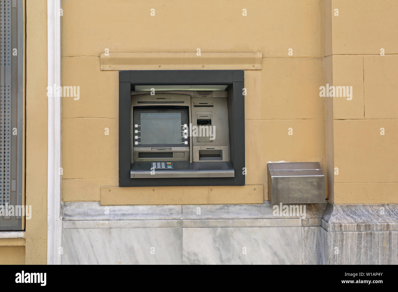 Automated Teller Machine at Bank Exterior Wall Stock Photo - Alamy