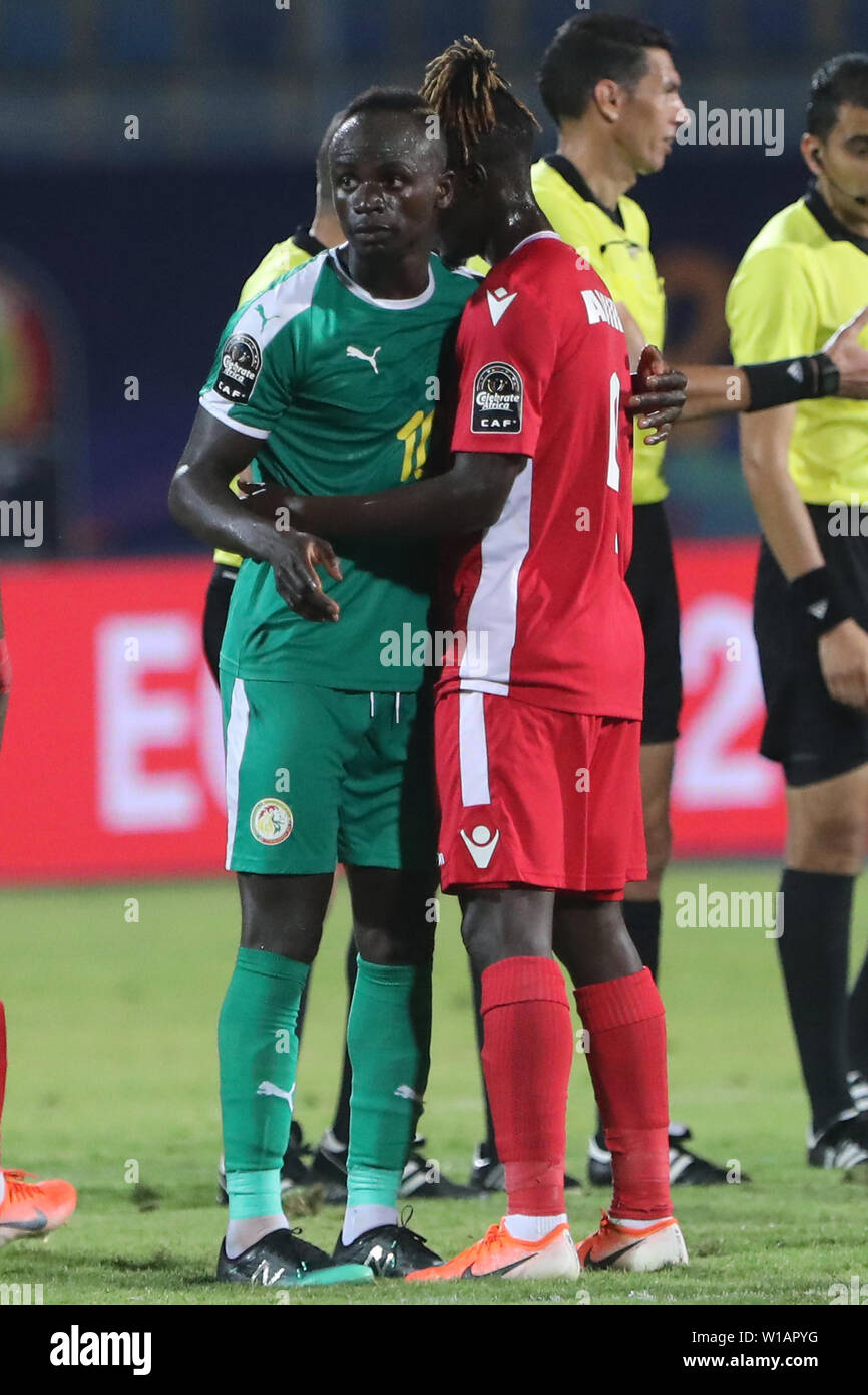 Cairo, Egypt. 01st July, 2019. Kenya's Joseph Okumu (R) and Senegal's ...
